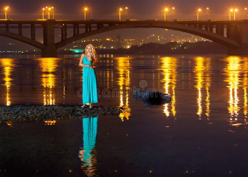 Girl at Night on the River Bank the Bridge Reflection Stock Photo ...