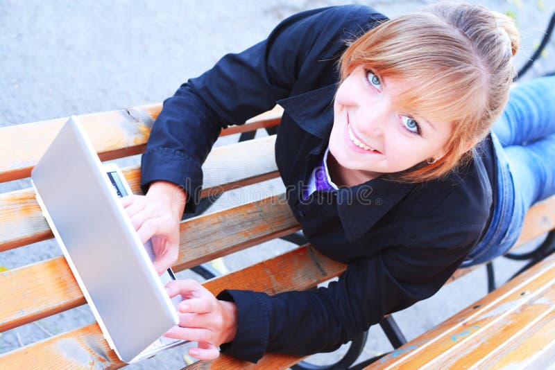 The girl with the notebook stock image. Image of read - 16633201