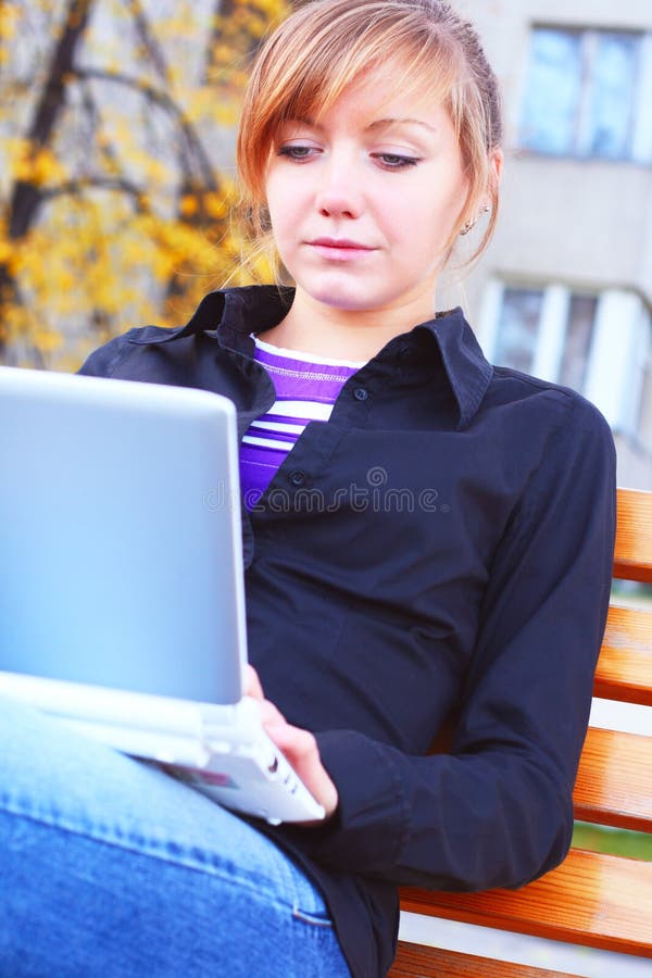 The girl with the laptop stock photo. Image of outdoors - 16457094