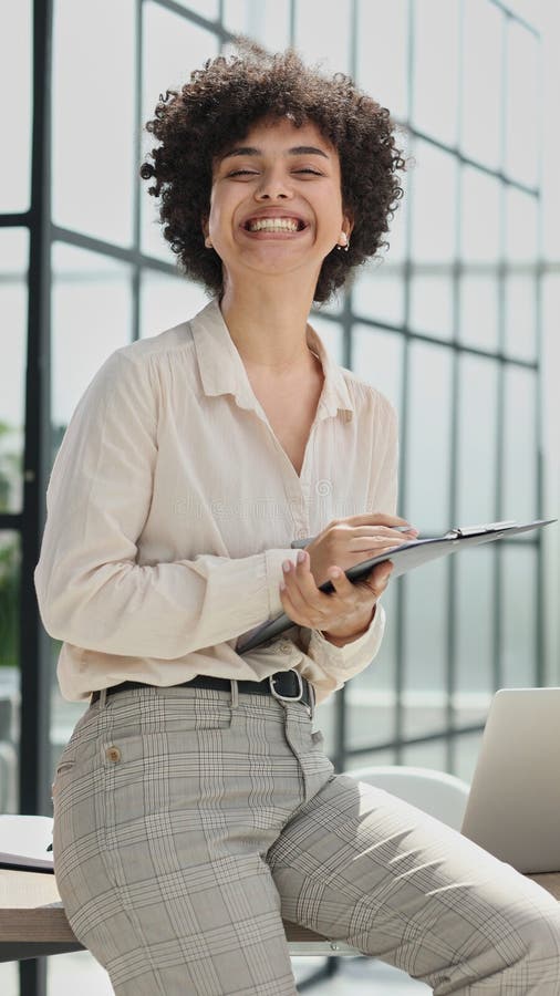 Girl in the Office Smiles Expresses Success and Leadership is Thinking ...
