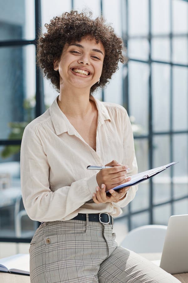 Girl in the Office Smiles Writing Notes Stock Image - Image of ...