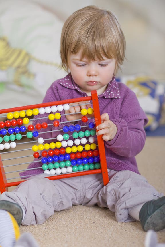 Girl one year old learning stock photo. Image of background - 13985062