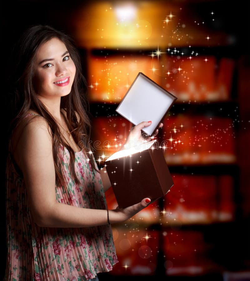 Girl Opening a Gift Box stock photo. Image of girl, concept - 26229202