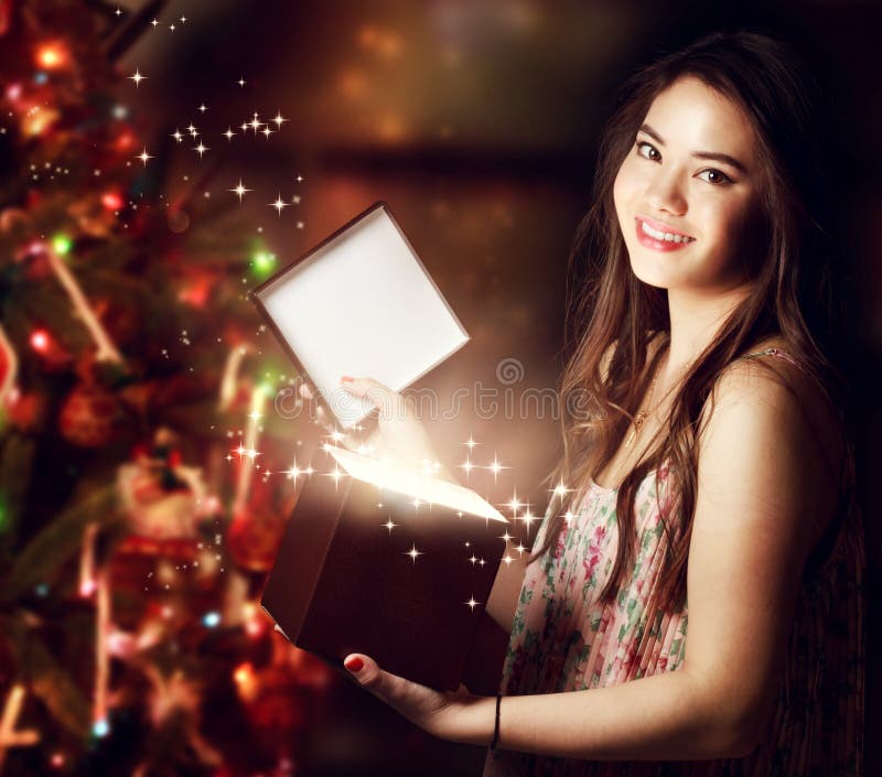 Girl Opening a Gift Box stock image. Image of magic, girl - 27259091