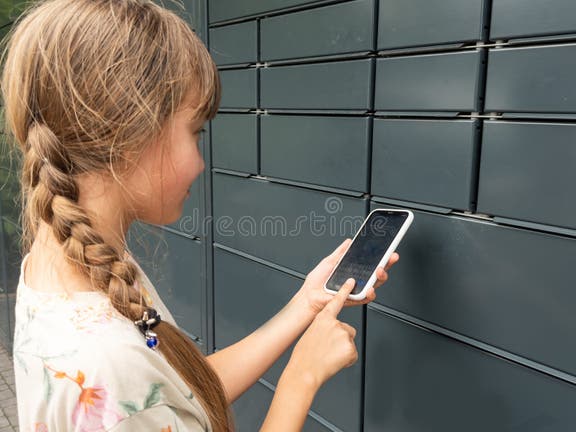 The Girl Opens the Mailbox with a Smartphone Stock Image - Image of ...