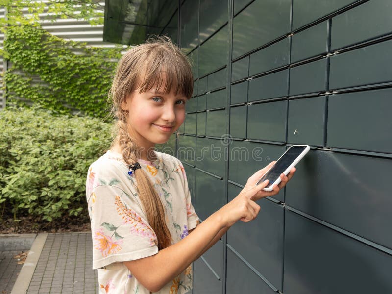 The Girl Opens the Mailbox with a Smartphone Stock Photo - Image of ...