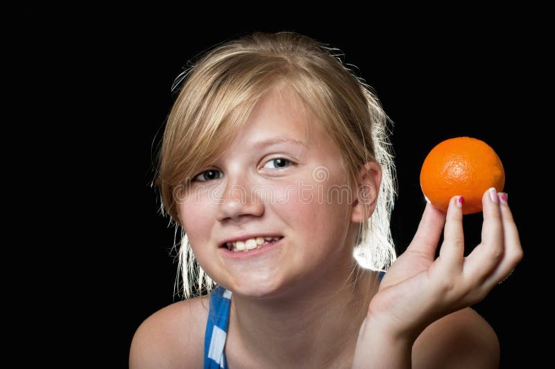 Girl with orange stock image. Image of healthcare, face - 26562707