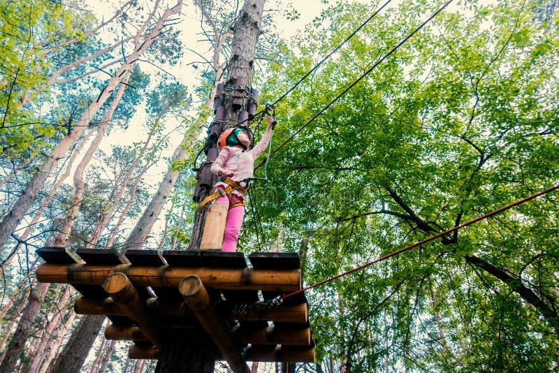The Girl Overcomes Obstacles on the Road from the Stretched Ropes Stock ...