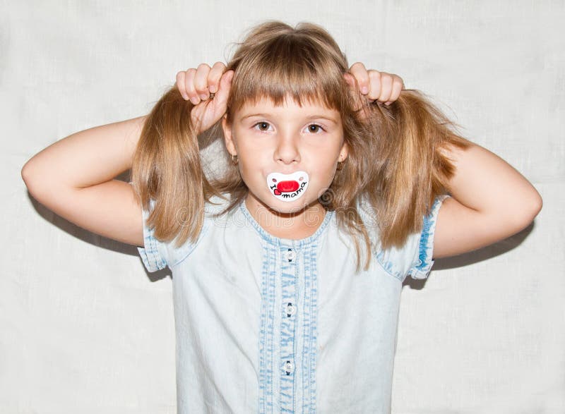 Girl with a pacifier stock image. Image of beautiful - 44929267