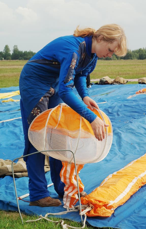 The Girl the Parachutist in Dark Blue Overalls Stock Photo - Image of ...