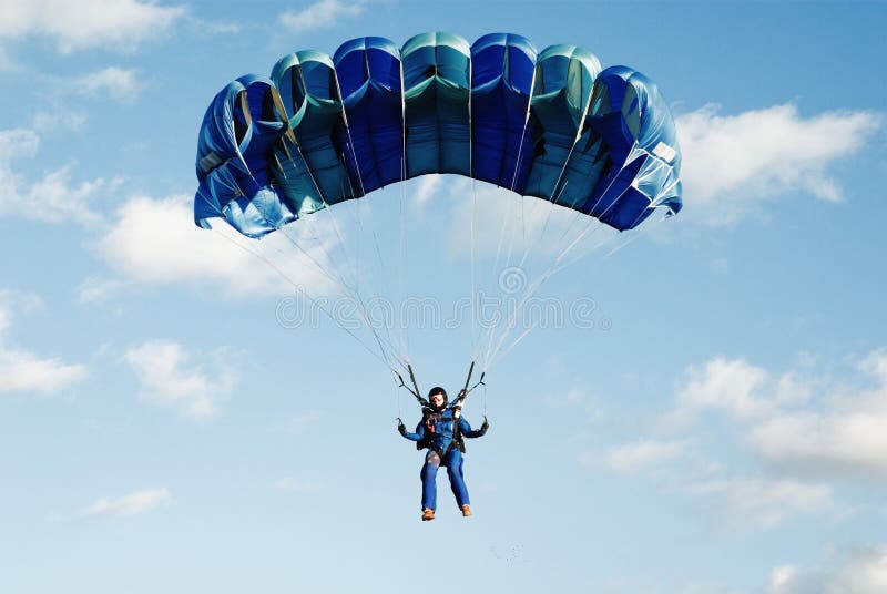 The Girl Parachutist in Dark Blue Overalls Stock Photo - Image of view ...