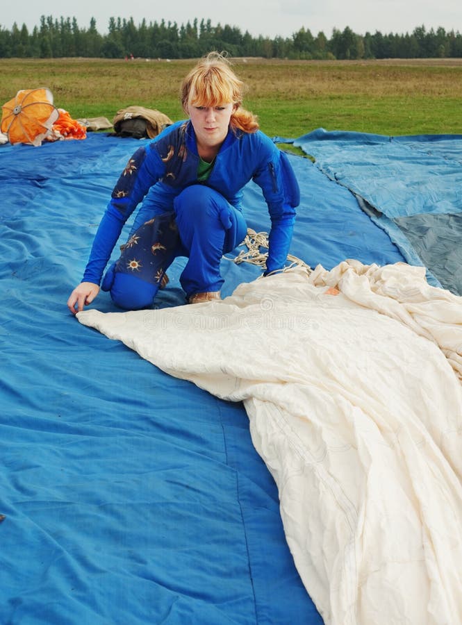The Girl Parachutist in Dark Blue Overalls Stock Photo - Image of ...