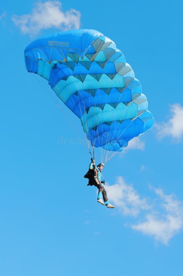 The Girl-parachutist Under a Blue Parachute Stock Photo - Image of ...