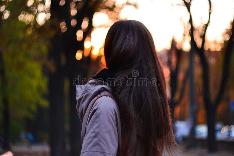 Girl in Park in the Evening Stock Image - Image of back, dusk: 62317707