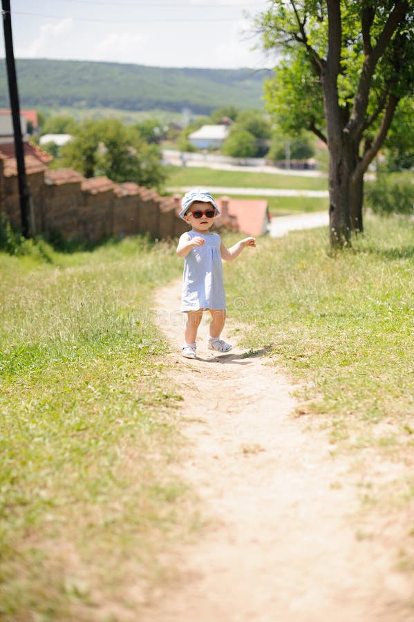 Girl on Path stock image. Image of dress, meadow, green - 41203569