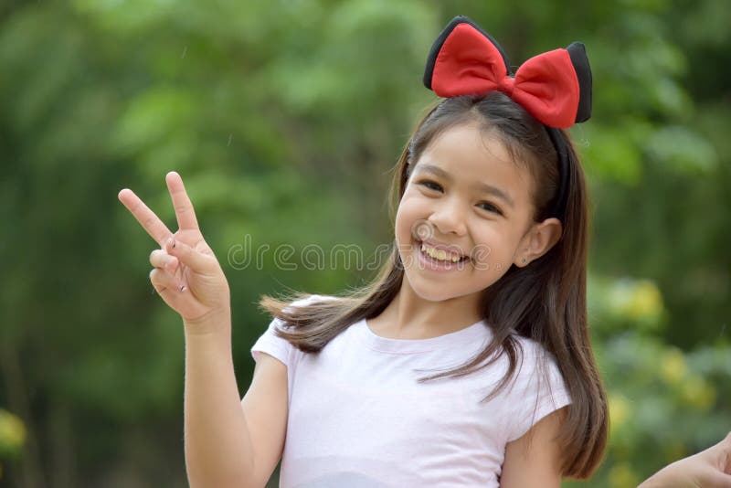 Girl and Peace Sign stock photo. Image of juvenile, pacifism - 156856954