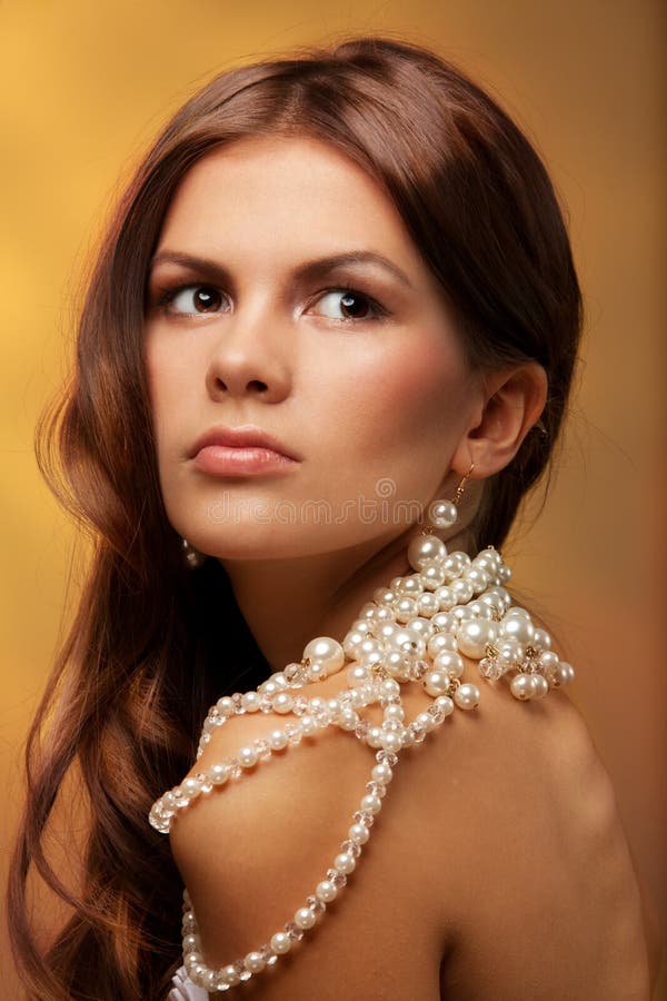 Girl with pearls necklace stock image. Image of brown - 22665415
