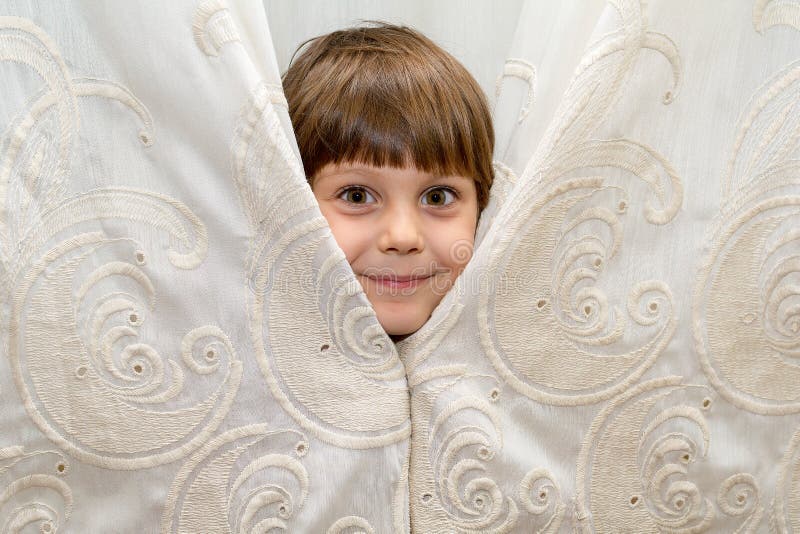 Girl Peeking from Curtains at Home Stock Photo - Image of emotion ...