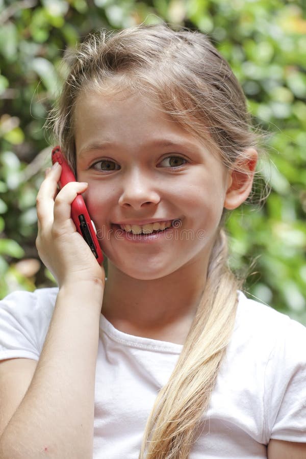 Girl with phone stock image. Image of play, technology - 20052735