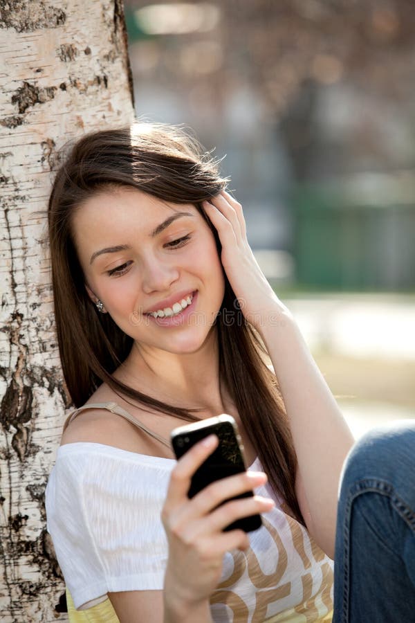 Girl with phone stock image. Image of hair, attractive - 24318257