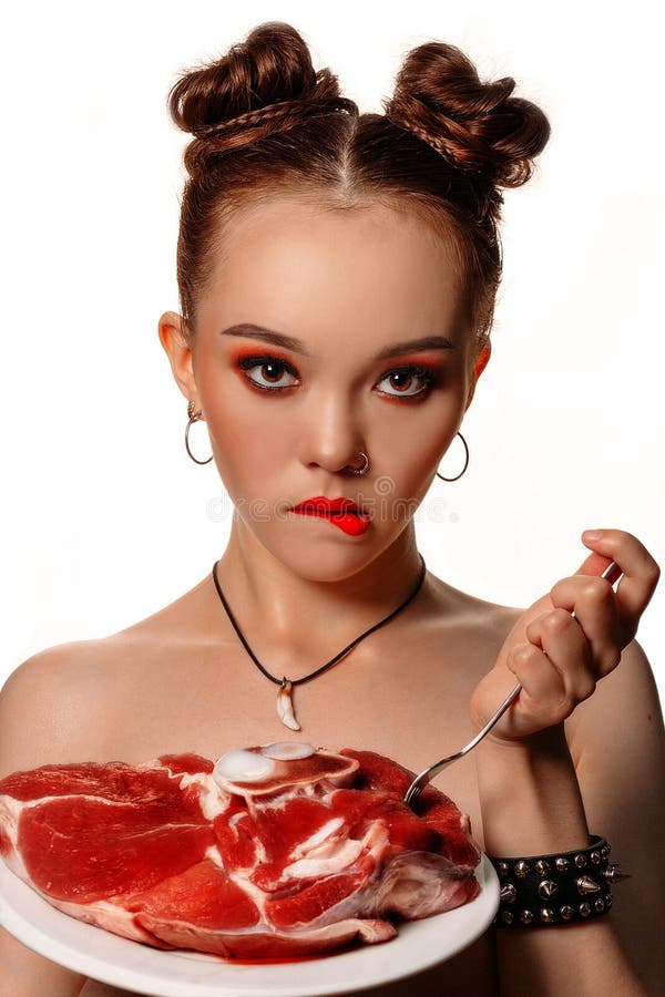 Girl with a piece of meat stock photo. Image of girl - 122829580