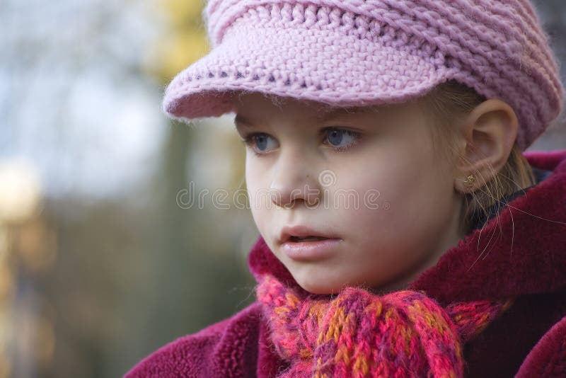 A girl in a pink cap stock image. Image of blonde, walk - 7410479