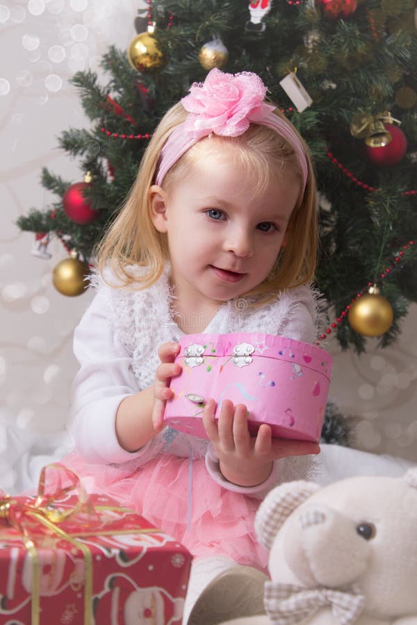 Girl in Pink Under Christmas Tree Stock Image - Image of pine, female ...