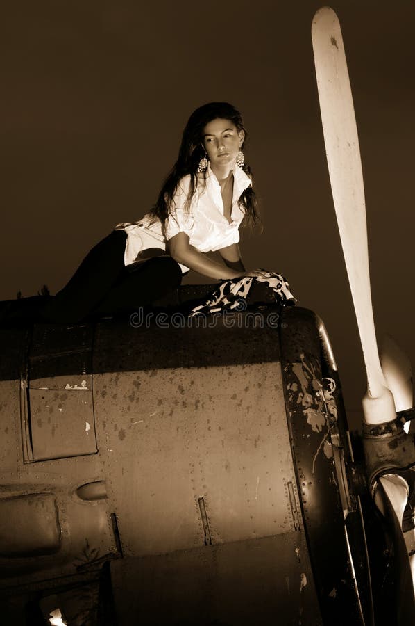 Girl on plane engine stock photo. Image of long, young - 16125672