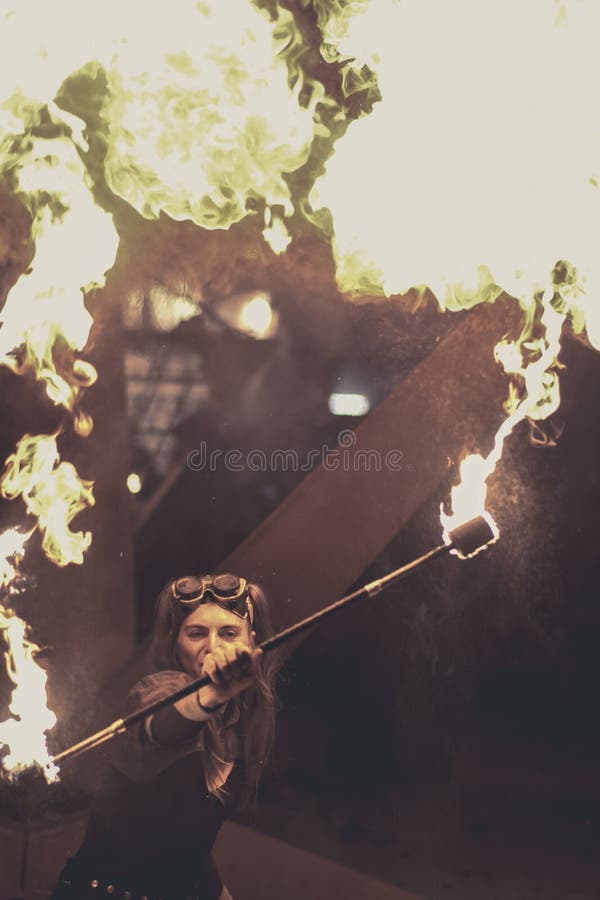 Girl play with fire editorial photo. Image of fire, circus - 94758391