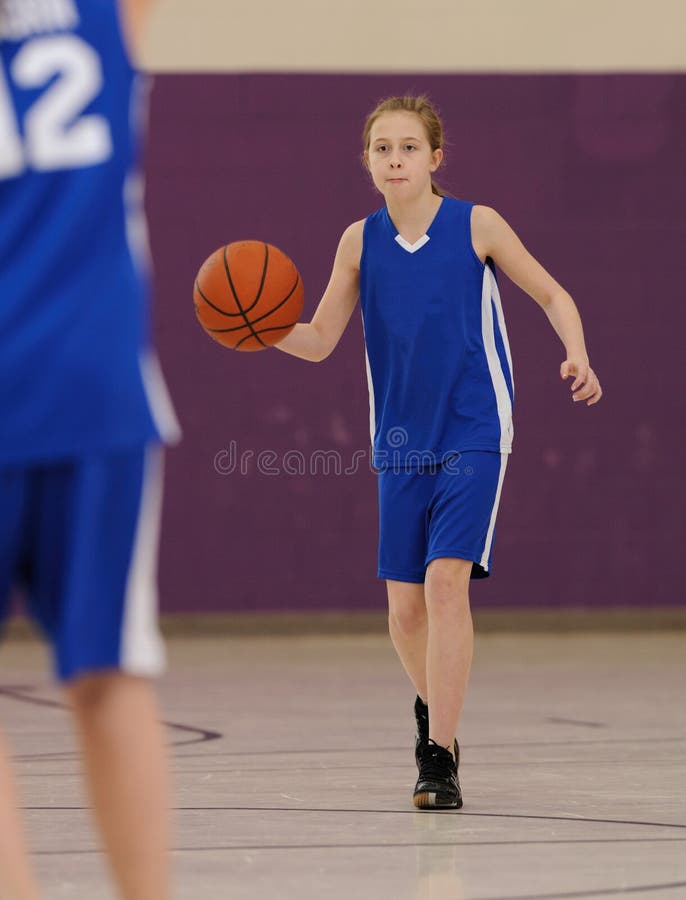 Girl playing basketball stock image. Image of pretty - 12604417