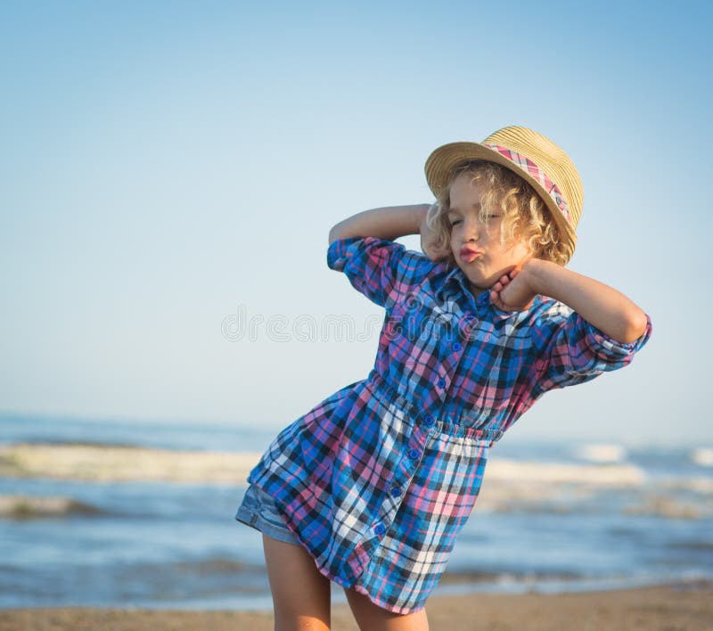 Girl playing on the beach stock image. Image of lifestyle - 76354995