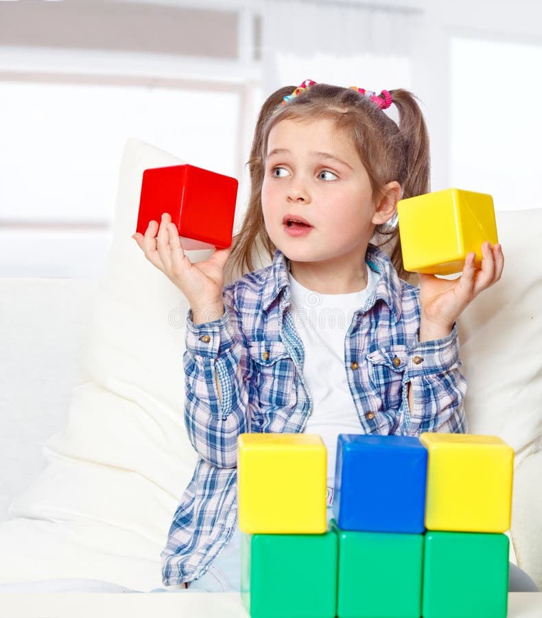 Girl playing with blocks stock photo. Image of seat, construction ...
