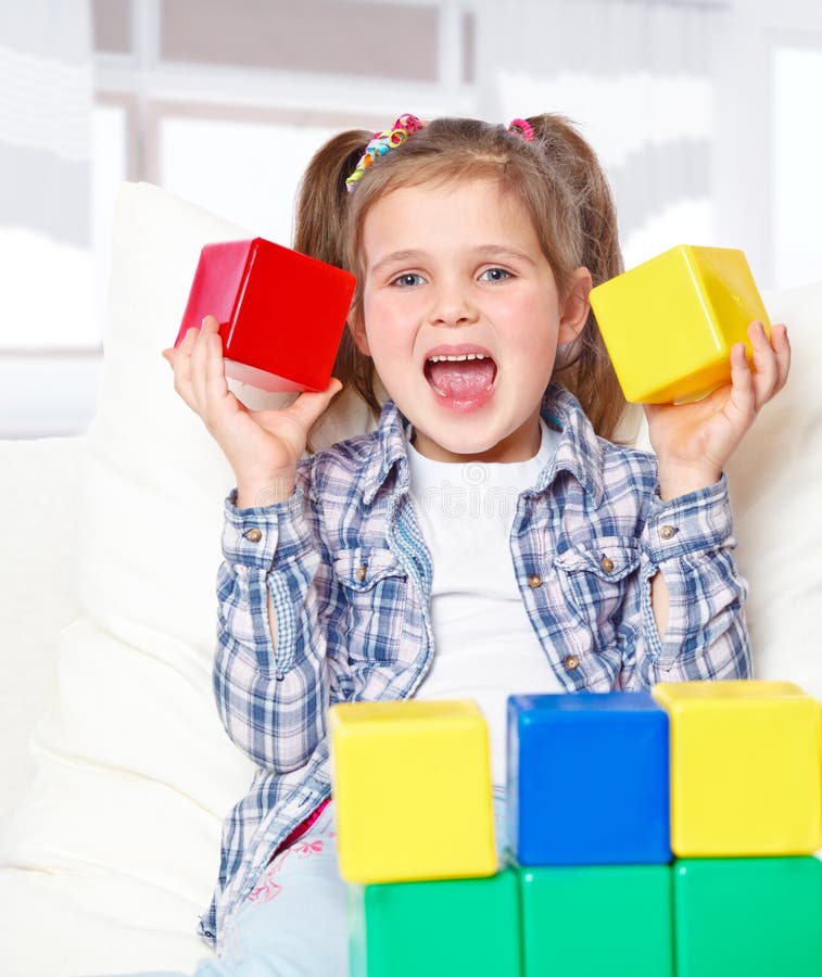 Girl playing with blocks stock photo. Image of girl, preschool - 28619718