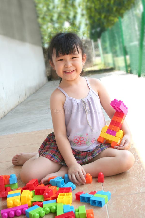 Girl playing blocks stock photo. Image of emotion, happy - 807012