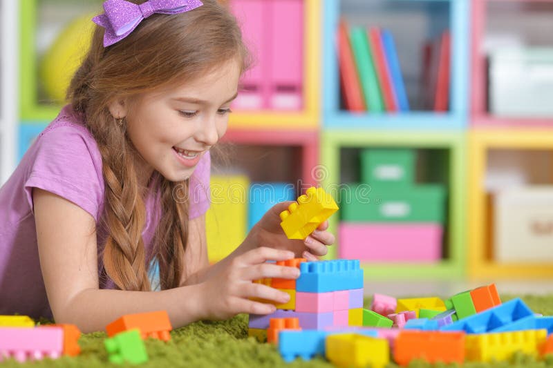 Girl playing with blocks stock image. Image of child - 95861321