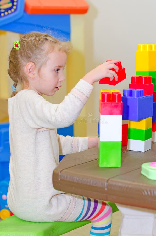 Girl Playing with Building Blocks Stock Photo - Image of color ...