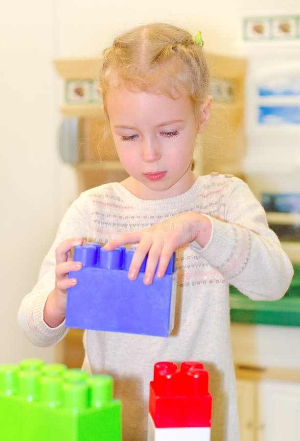 Girl Playing with Building Blocks Stock Image - Image of leisure ...