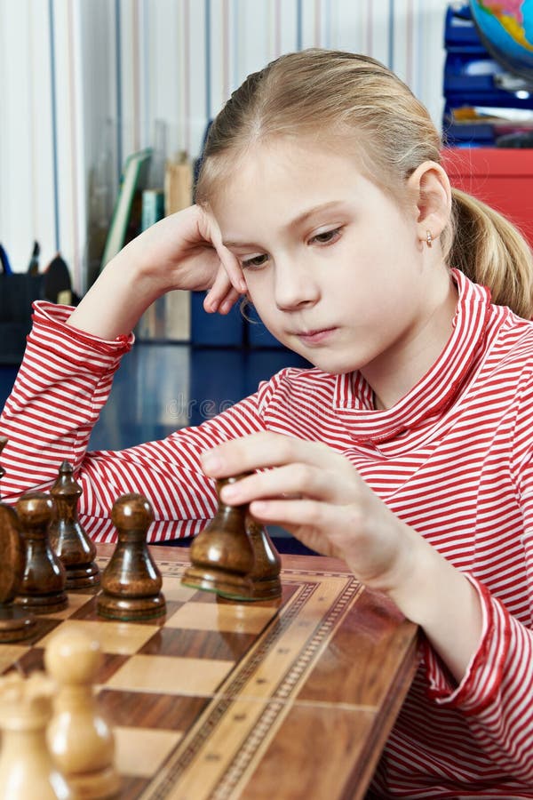 Girl playing in chess game stock image. Image of girl - 50542745