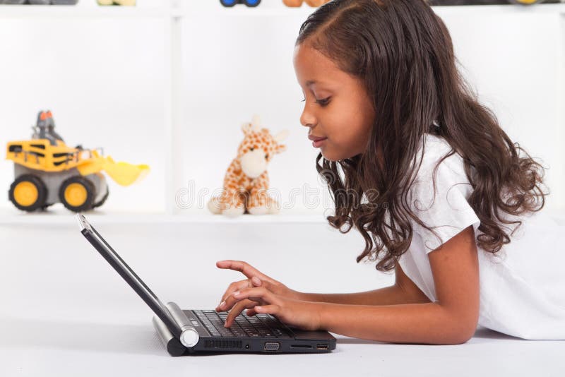Girl playing computer stock image. Image of american - 15528315