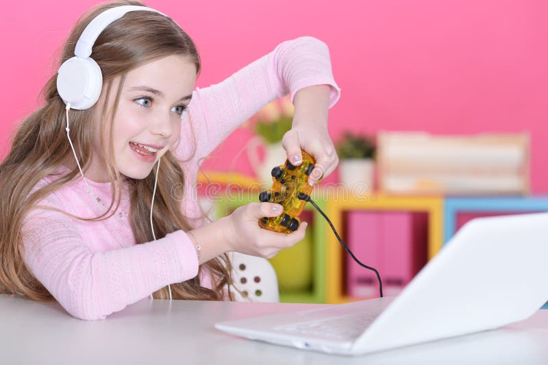 Girl Playing a Computer Game Stock Photo - Image of desk, people: 87655810