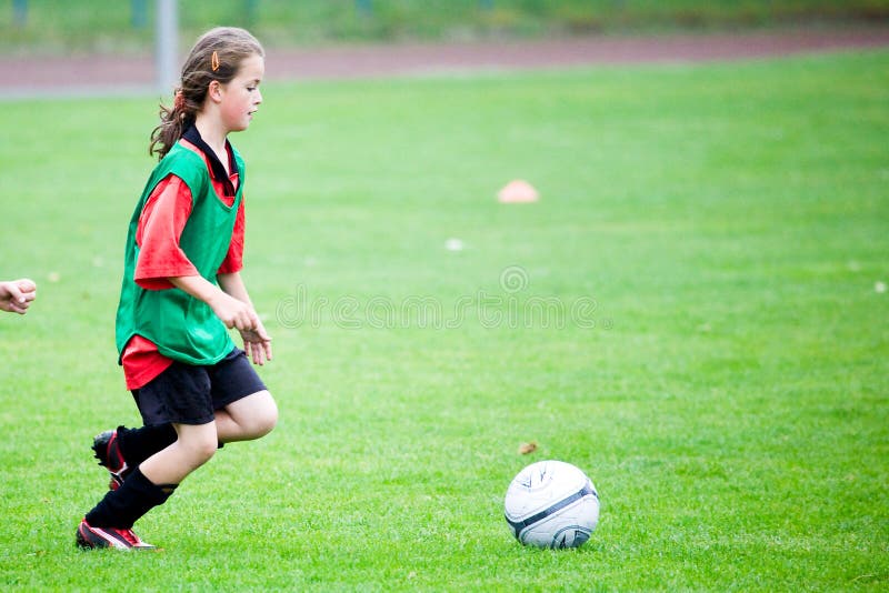 Girl Playing Football Stock Image - Image: 10069861
