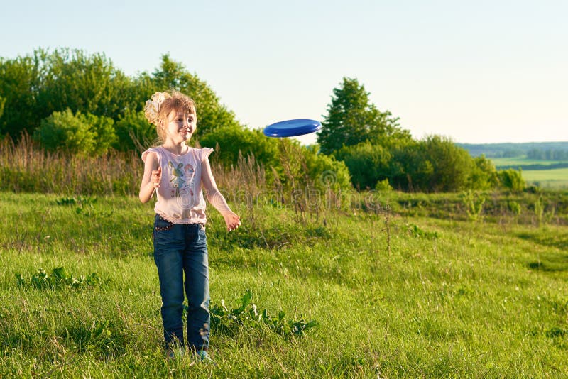Girl Playing Frisbee in the Park Stock Image - Image of leisure, little ...
