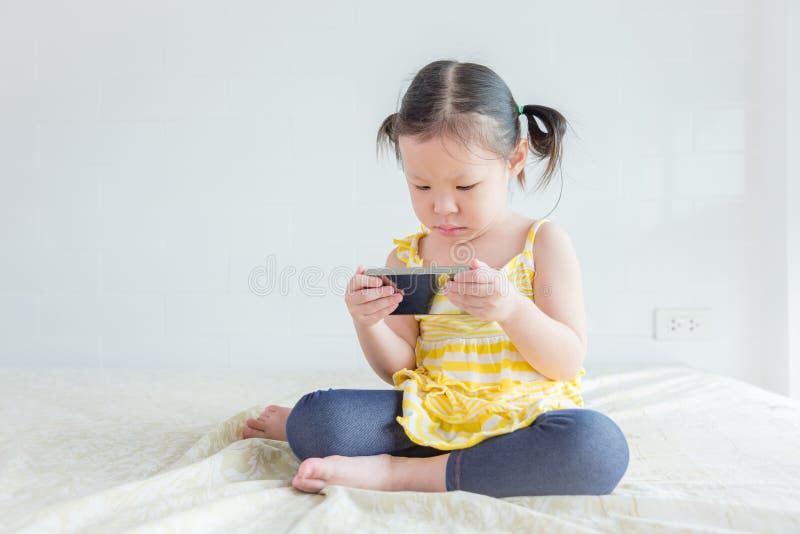 Girl Playing Game on Cellphone Stock Image - Image of addict, playing ...