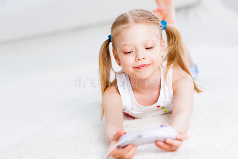 Girl Playing on a Game Console Stock Image - Image of childhood ...