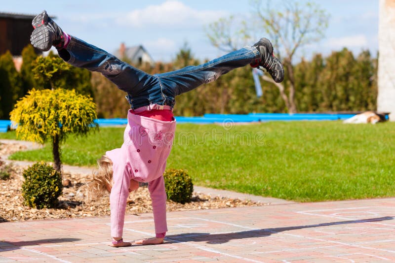 Girl Playing in the Garden in Spring Stock Image - Image of active ...
