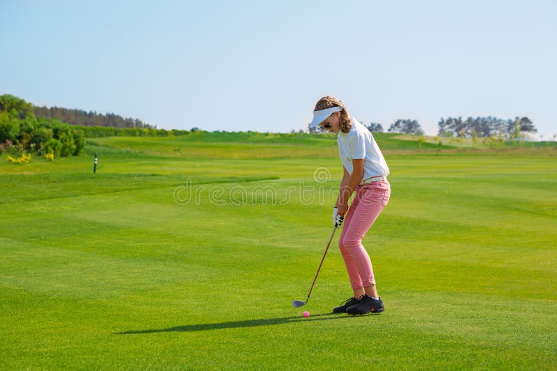 Girl playing golf stock image. Image of hold, golf, outside - 60480183