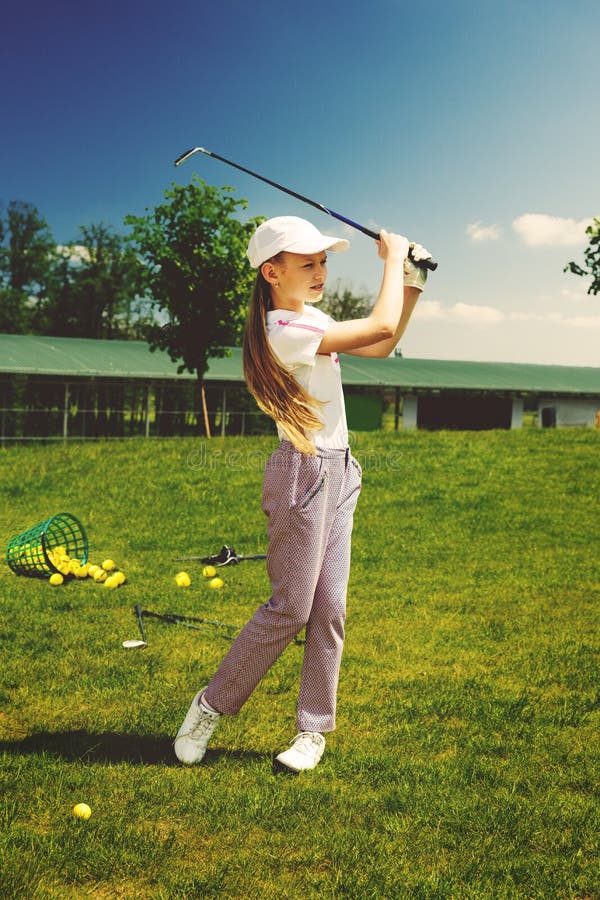 Girl playing golf stock photo. Image of energy, golfer - 58226204