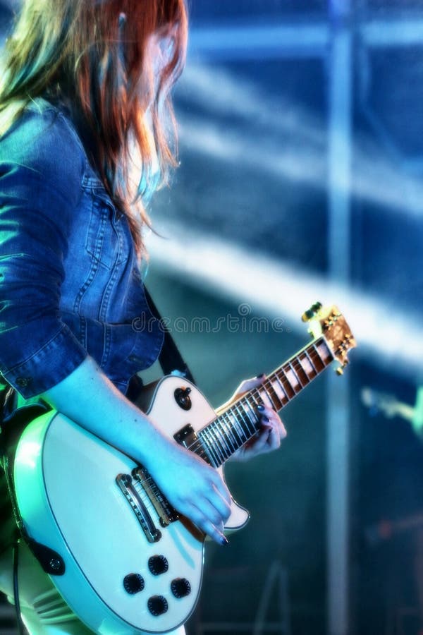Girl Playing Guitar editorial stock photo. Image of band - 73666548