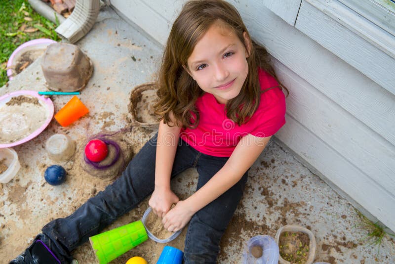 Girl Playing with Mud in a Messy Soil Smiling Portrait Stock Photo ...