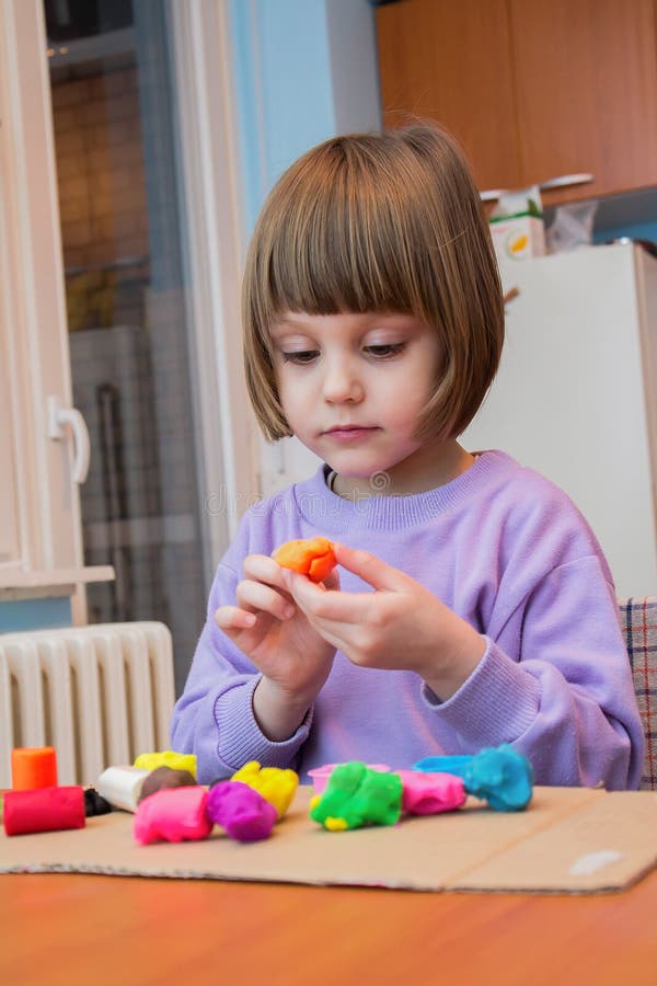 Girl Playing with Play Dough - Plasticine Stock Photo - Image of girls ...